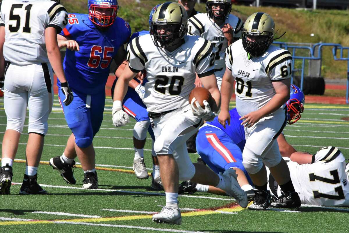 Carlson’s INT return completes Tolland’s comeback victory over Barlow