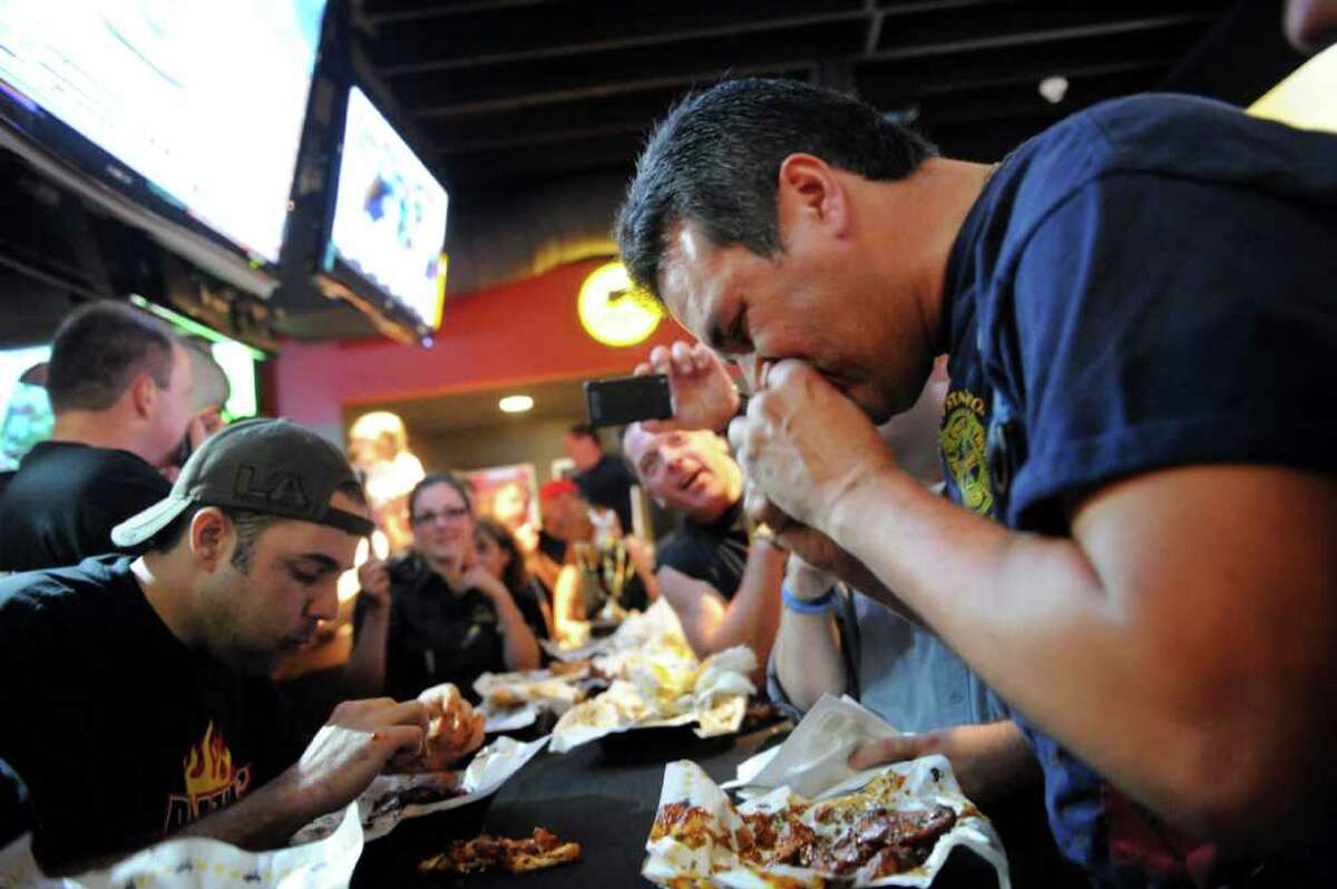 Stamford firefighters torch wing-eating competition