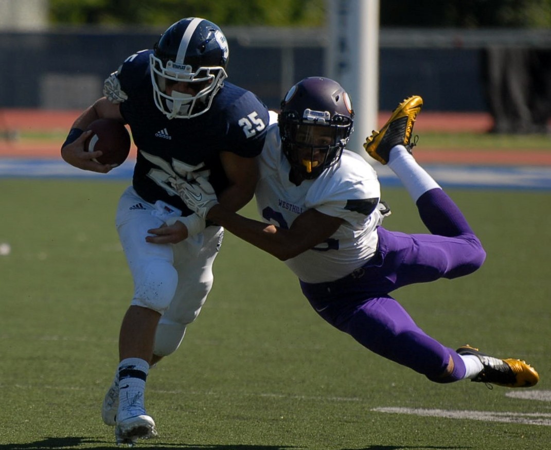 Football: Burger, defense shine in Staples' win over Westhill