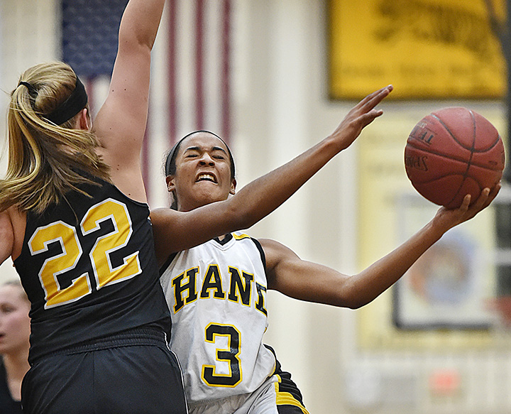 Girls basketball: No. 8 Hand routs Law, stays unbeaten