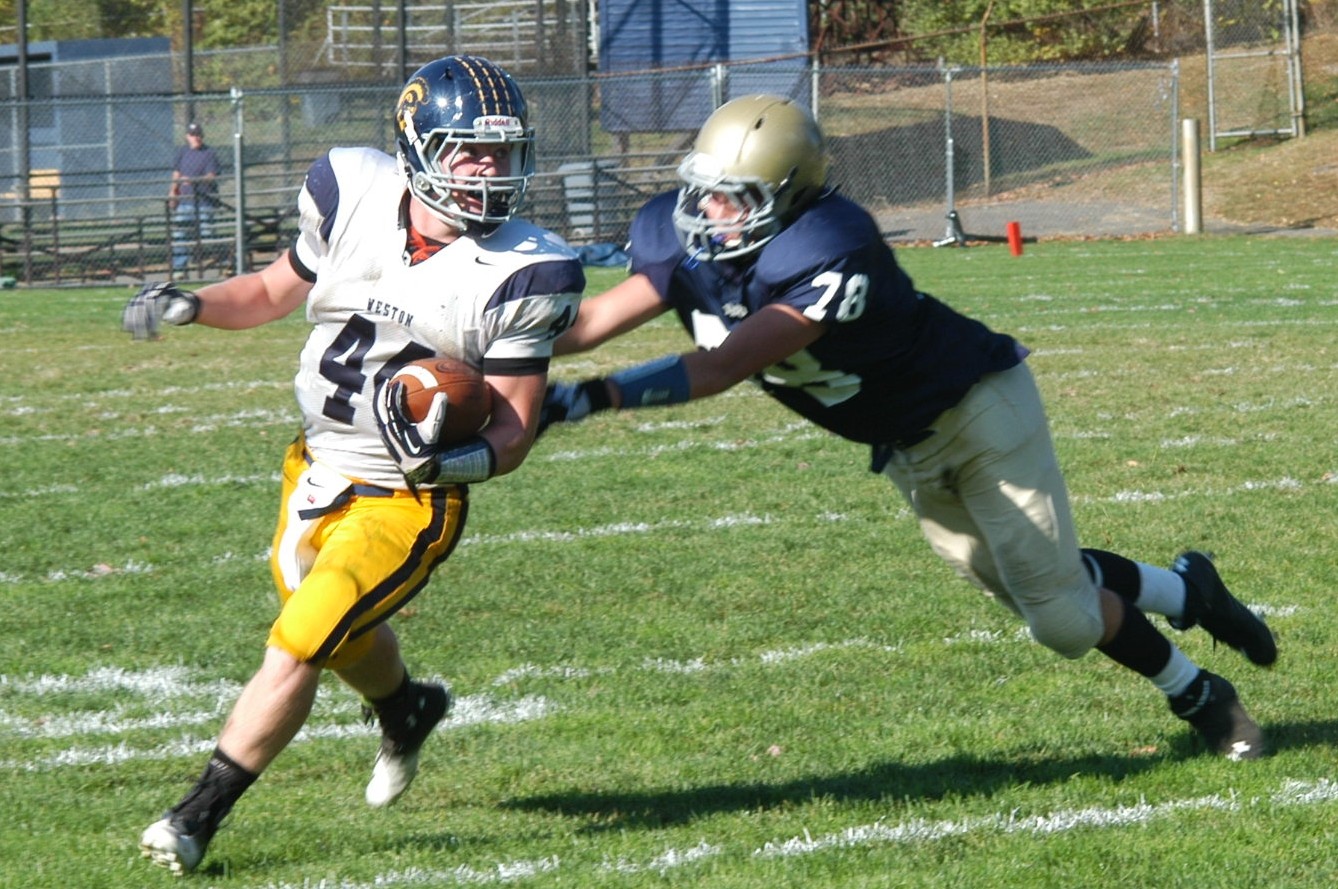 Trojans topple Lancers in wild football game