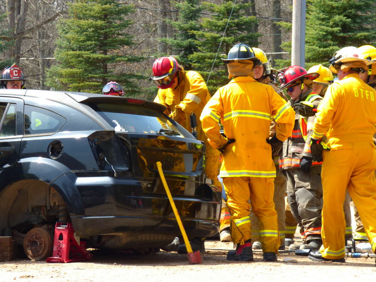Firefighters crack open cars for auto extrication training