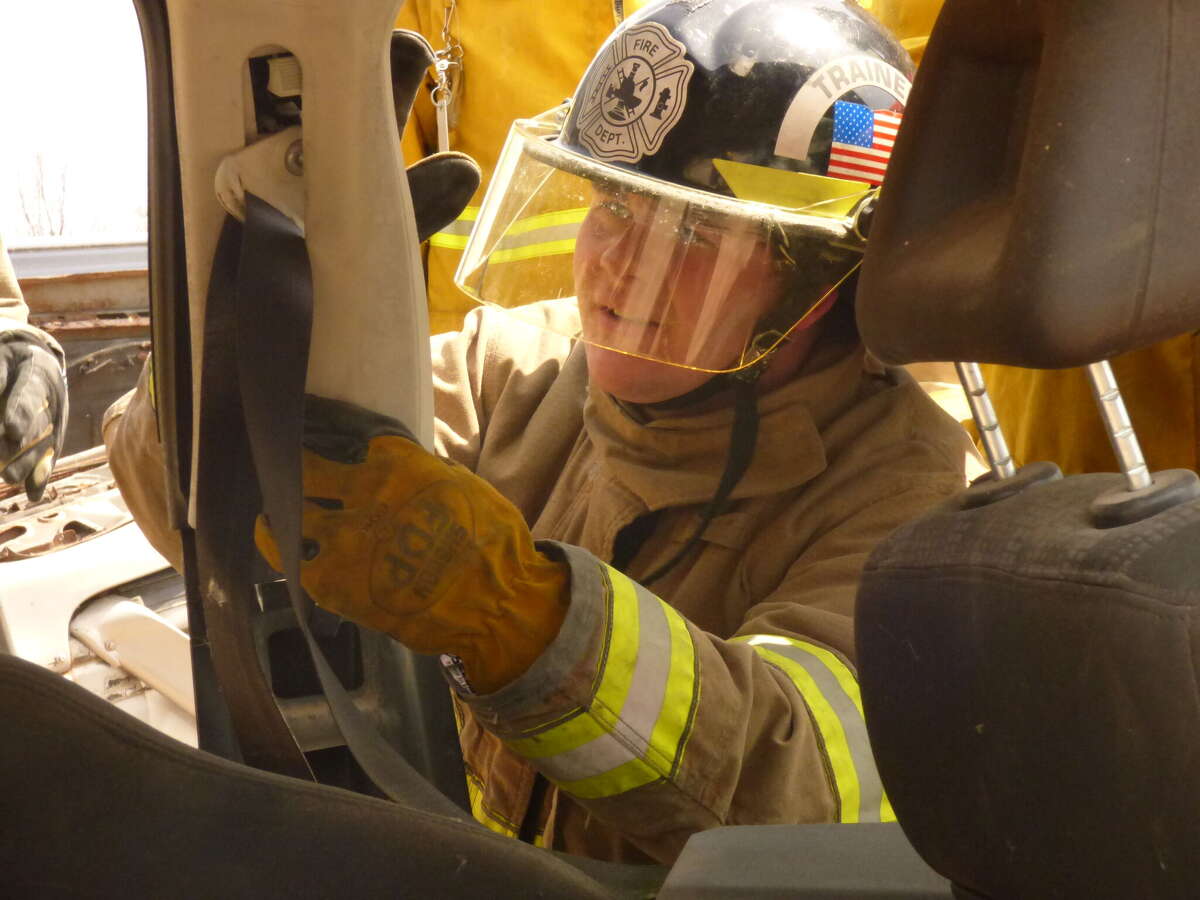 Firefighters crack open cars for auto extrication training
