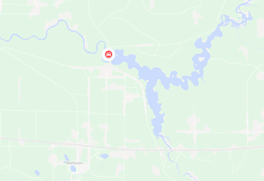 Vehicle partly submerged in Manistee River at Tippy Dam access