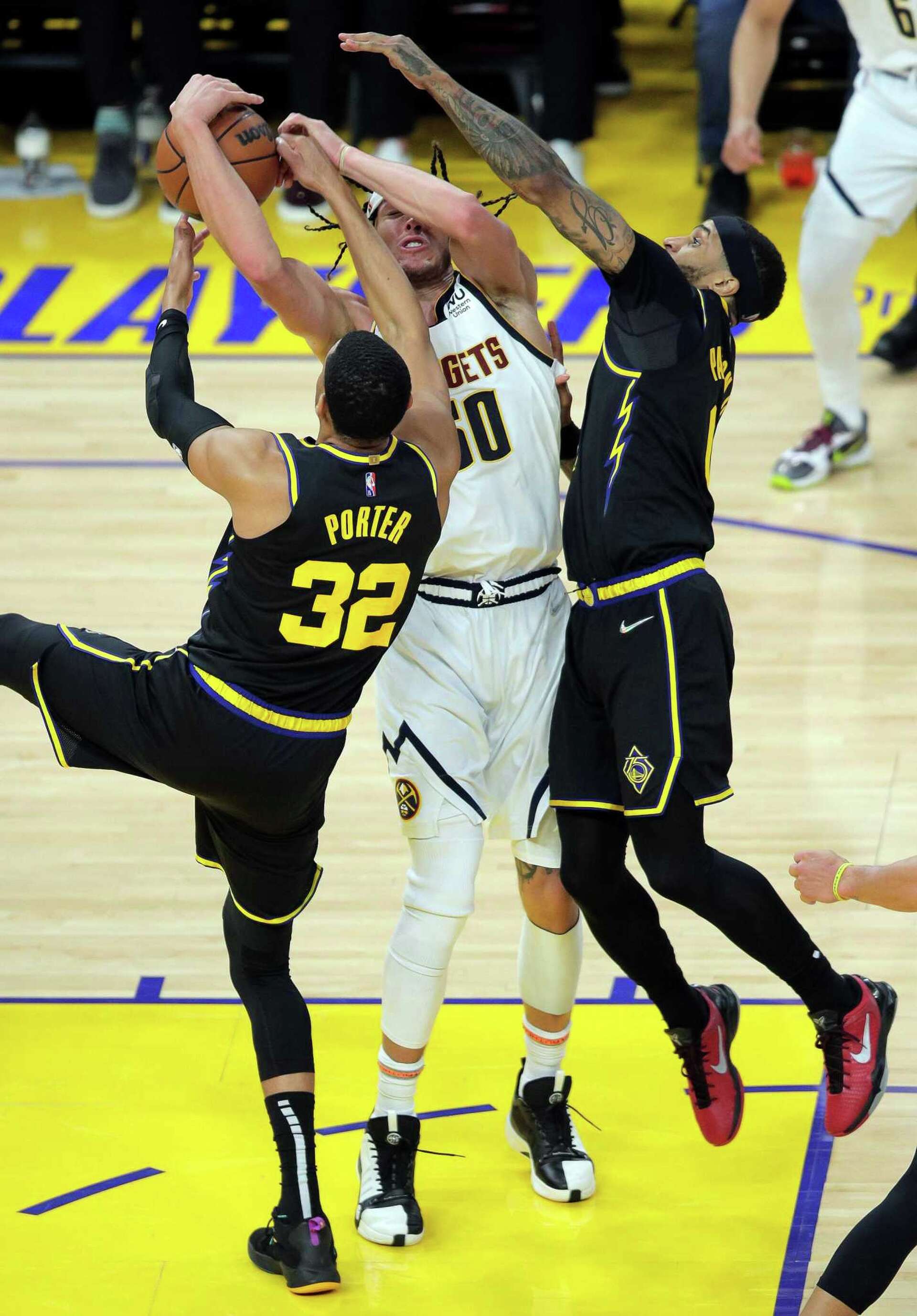 Warriors crank up defense against Nuggets when it matters, survive ...