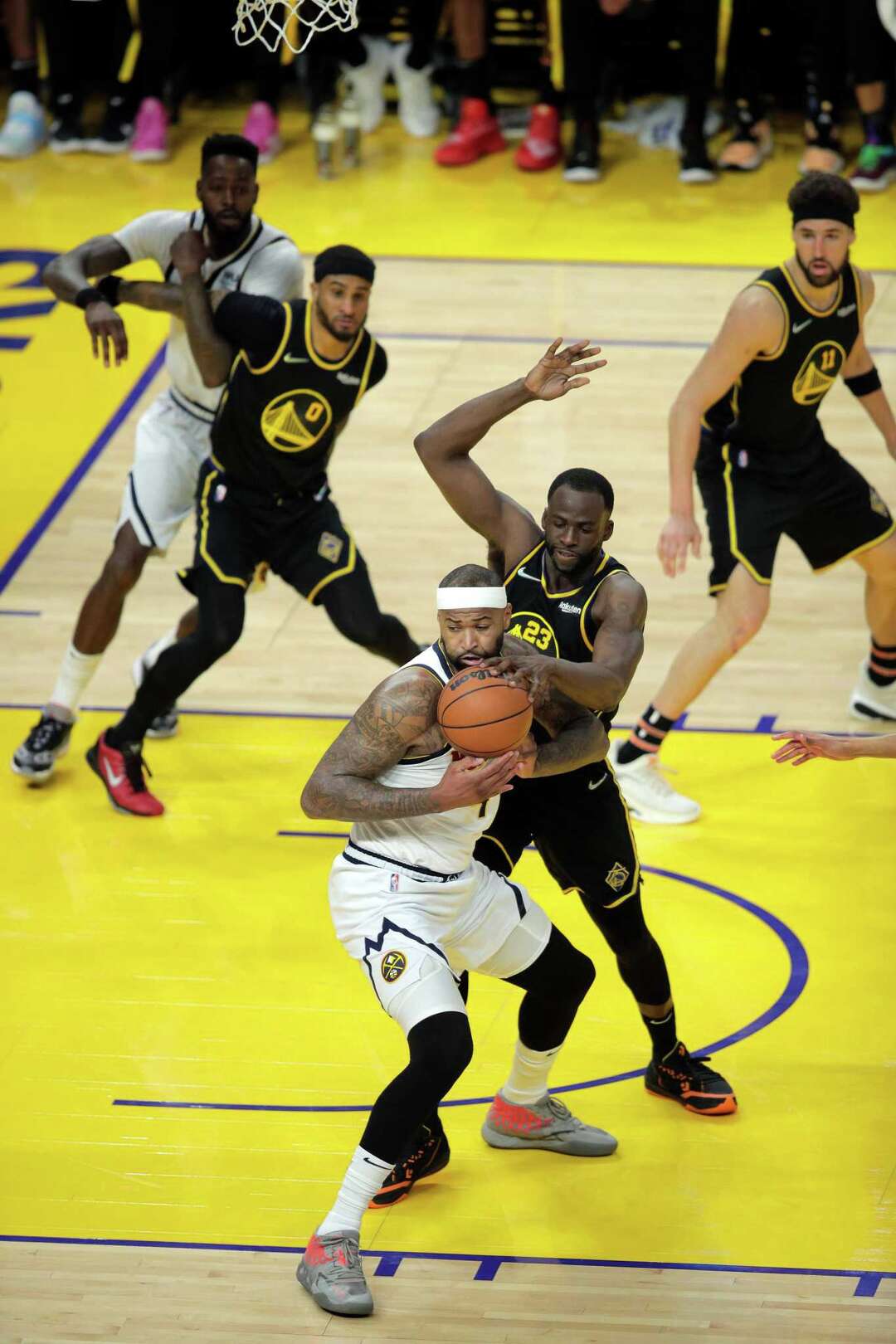Warriors crank up defense against Nuggets when it matters, survive ...
