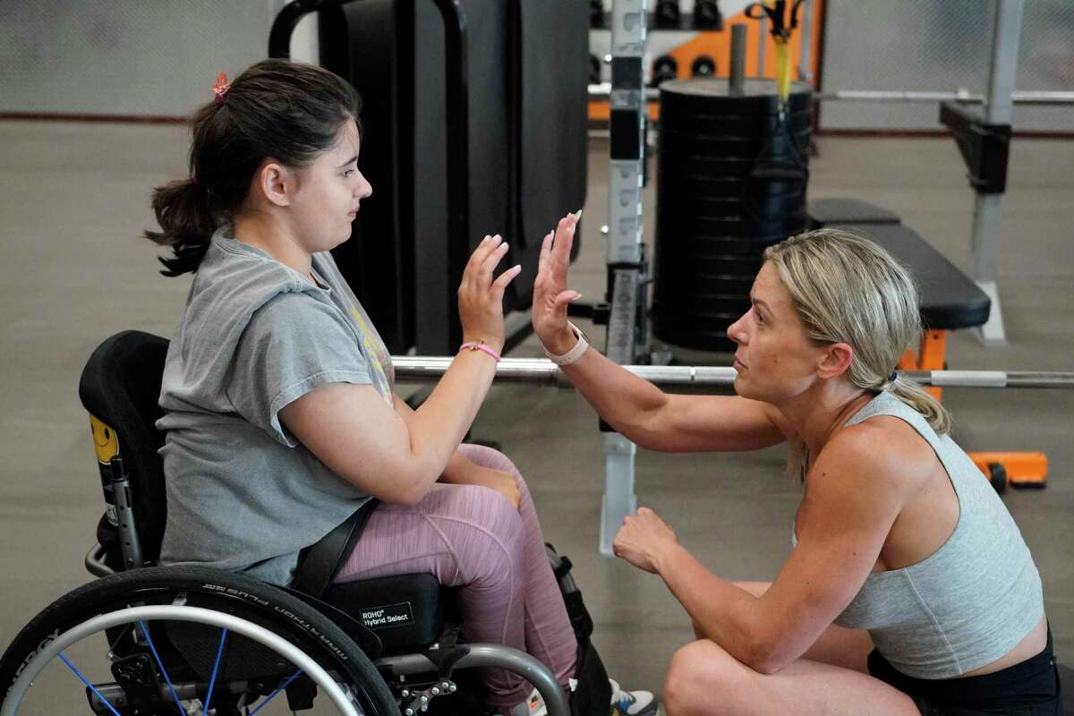 Workouts give Houston mom and paralyzed daughter physical and emotional ...