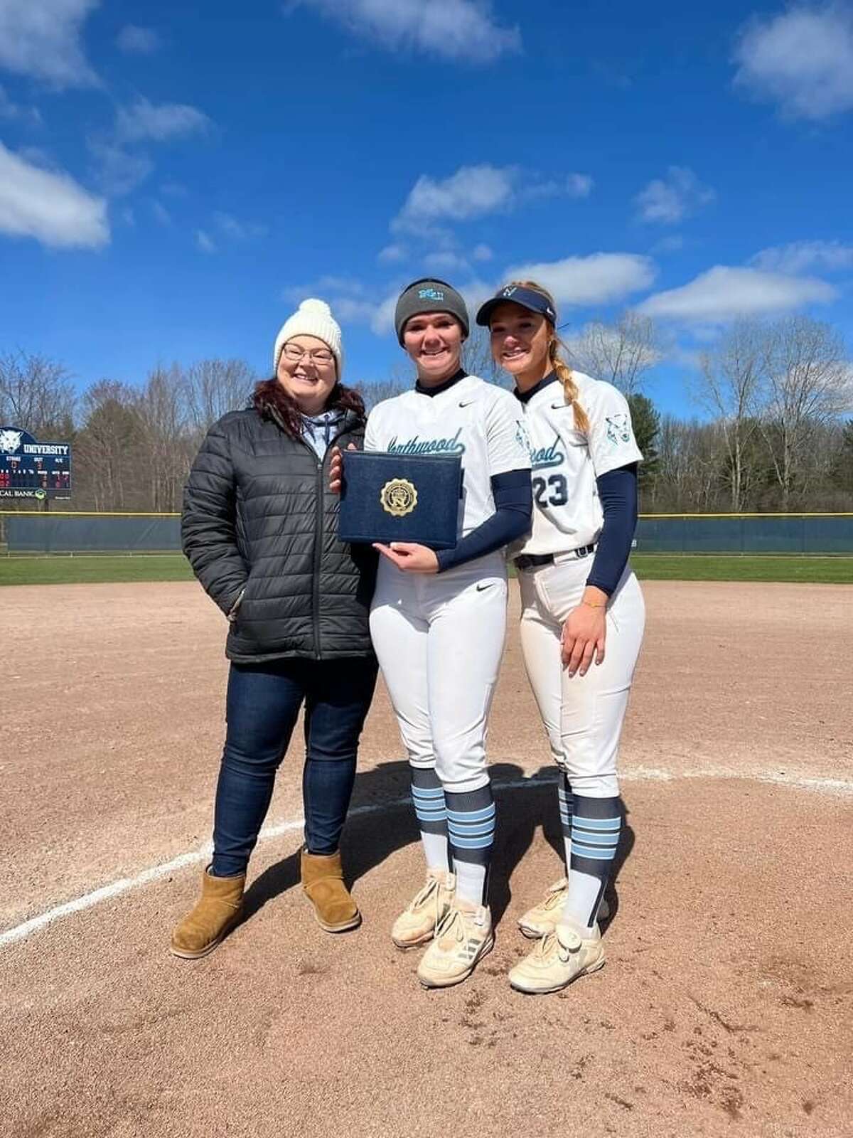 Northwood softball players support mom through third brain cancer surgery