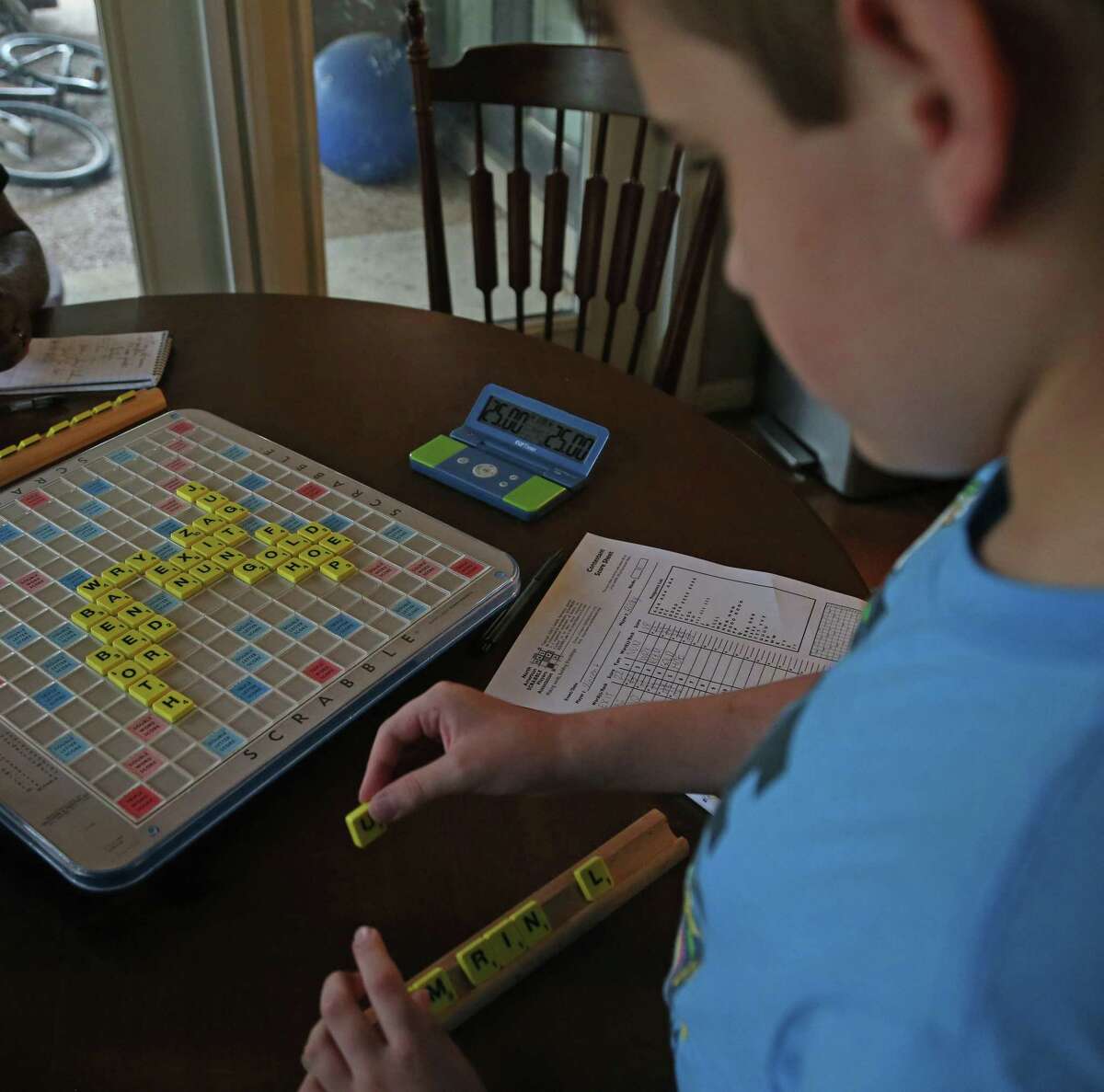 Scrabble star in two languages, S.A. boy with autism finds peace
