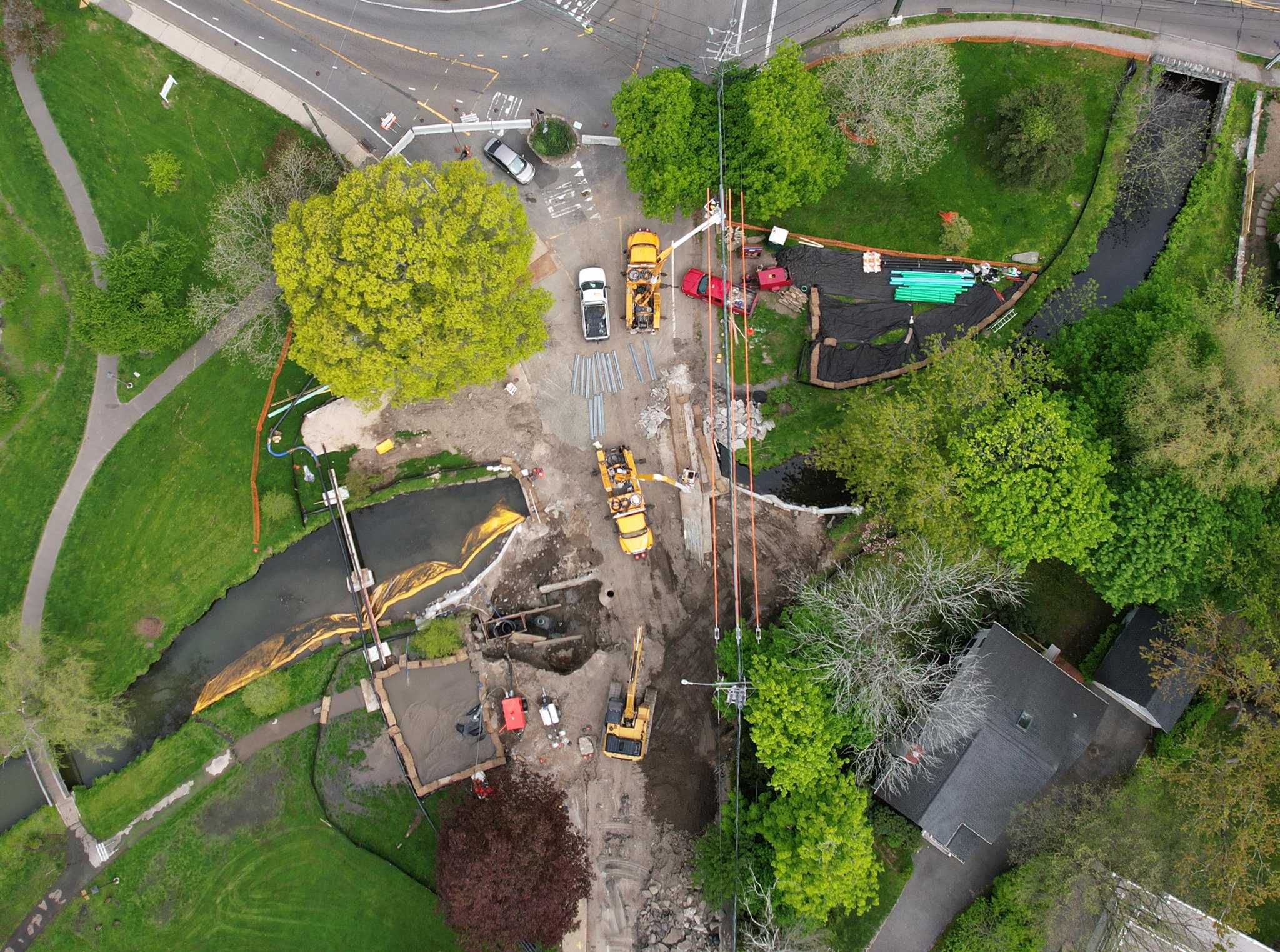 In photos: Digging up road, detouring traffic in Old Greenwich to make ...