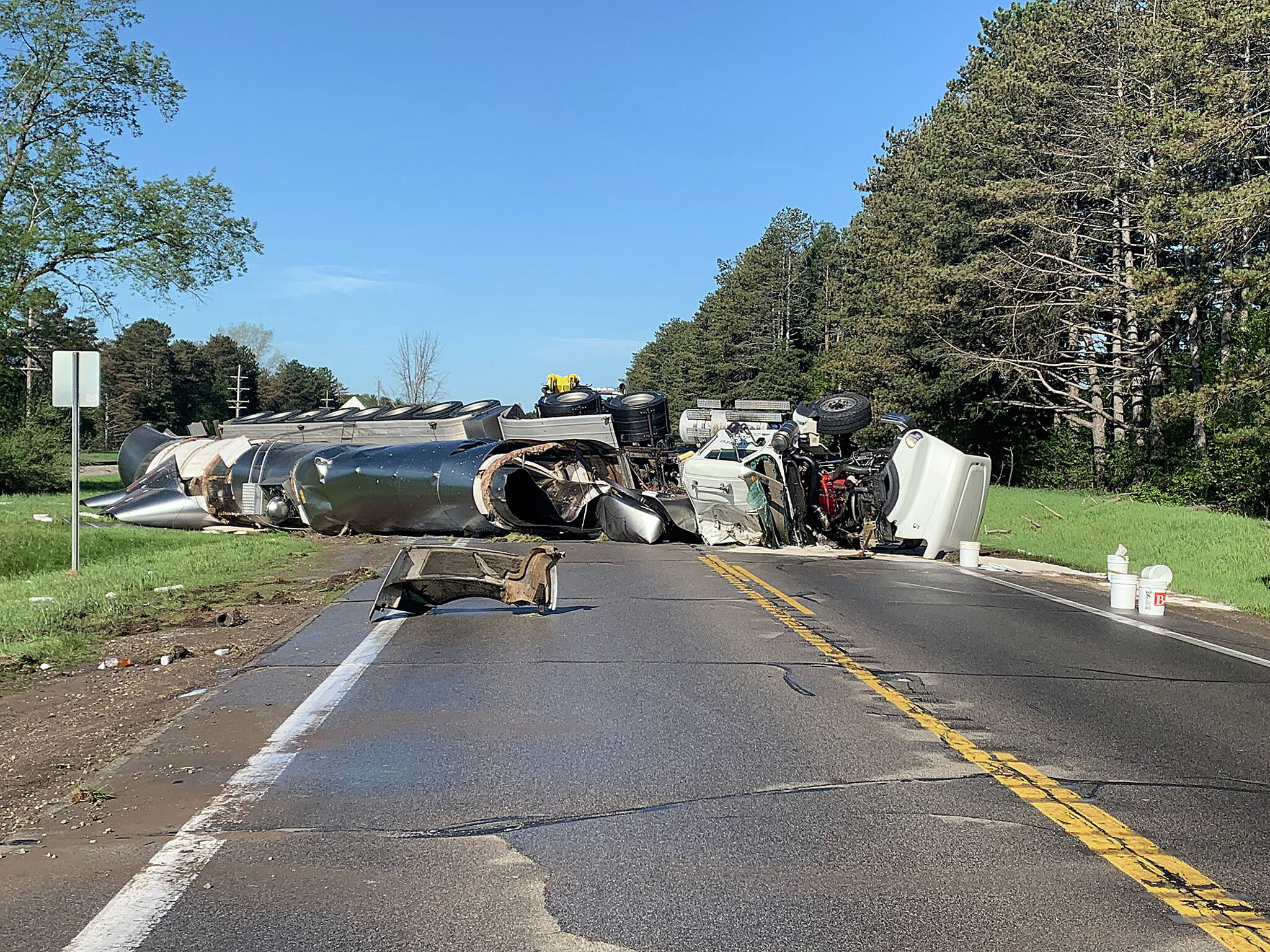 Milk tanker rolls over in Tuscola County, spills 12K gallons after ...