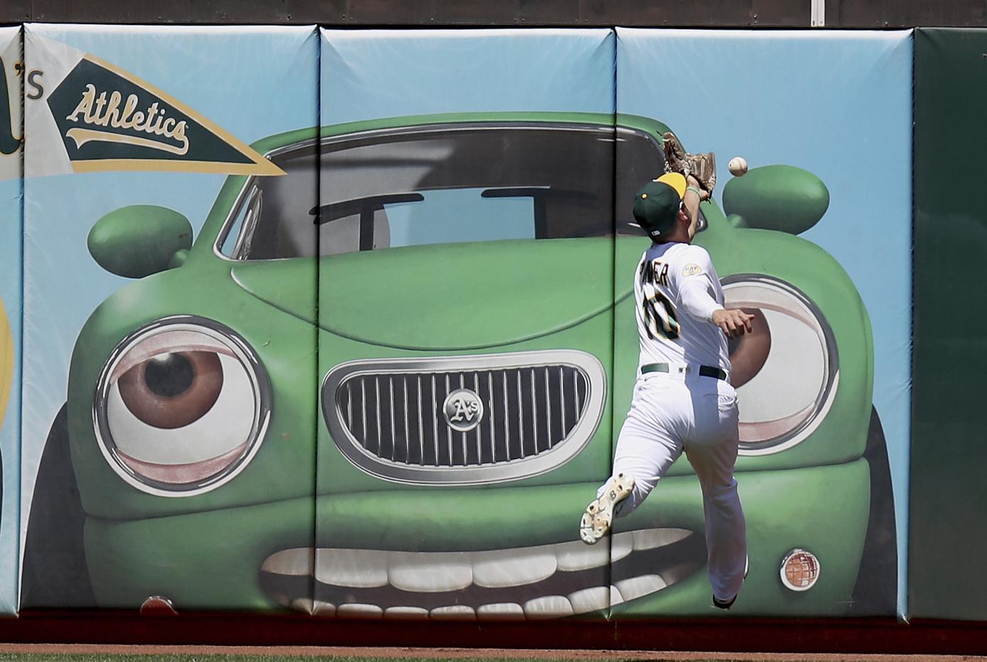 A’s routed 14-4 by Twins; Chad Pinder makes pitching debut