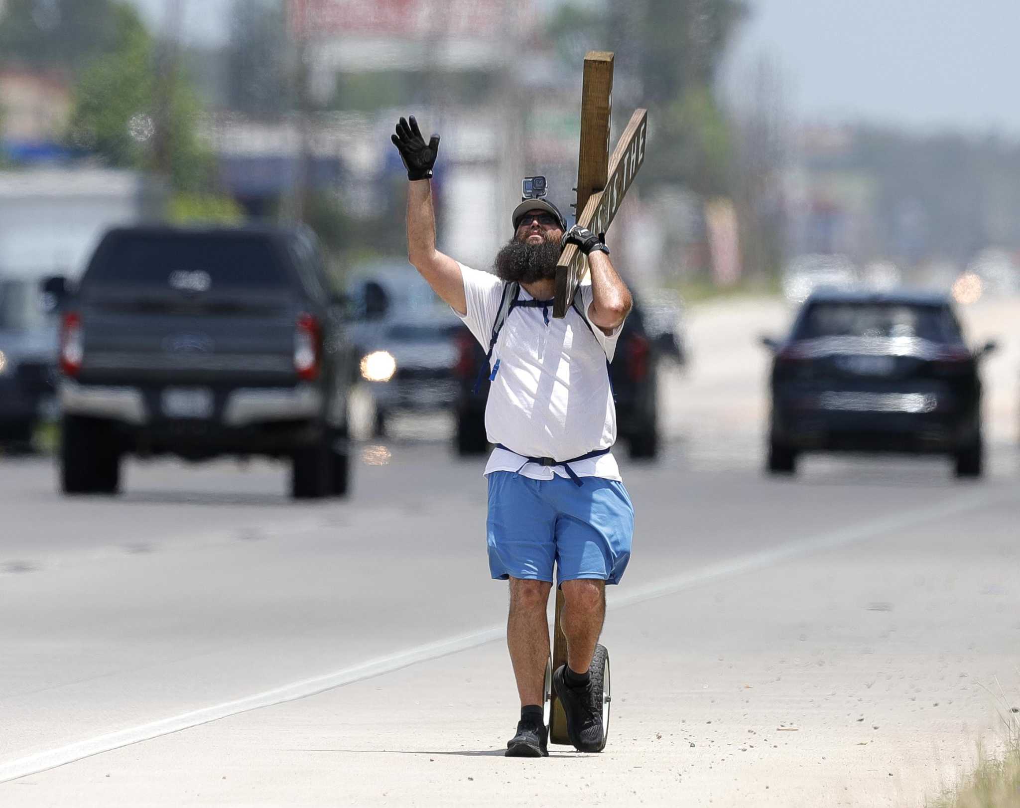 Woodlands Man Quits His Job To Carry An 8 foot Wooden Cross On Roadways woodlands-man-quits-his-job-to-carry-an-8-foot-wooden-cross-on-roadways
