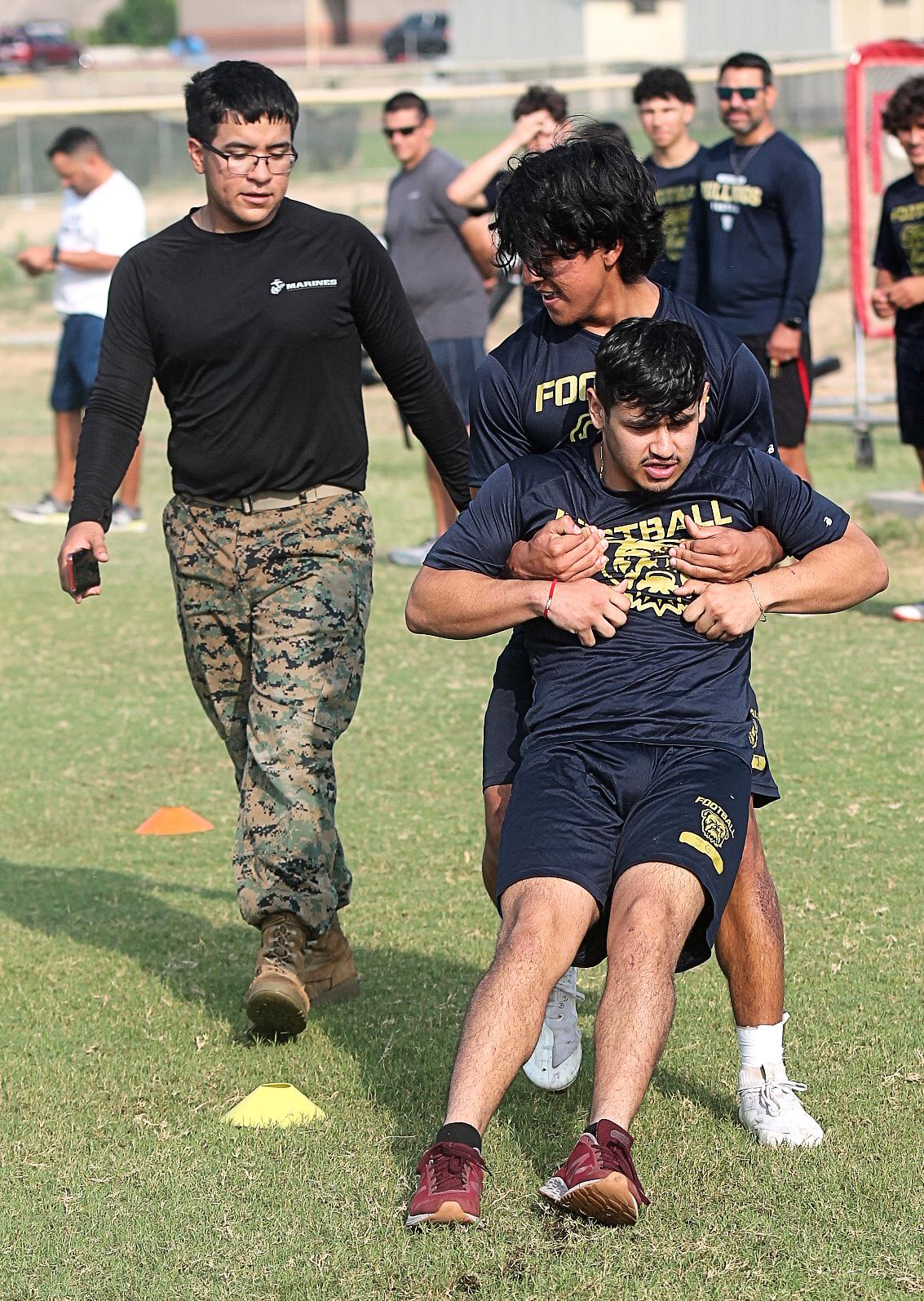 Laredo coach honored by Marines