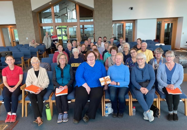 How Benzie County's 100+ Women Who Care gifted $15,100 to community chorus