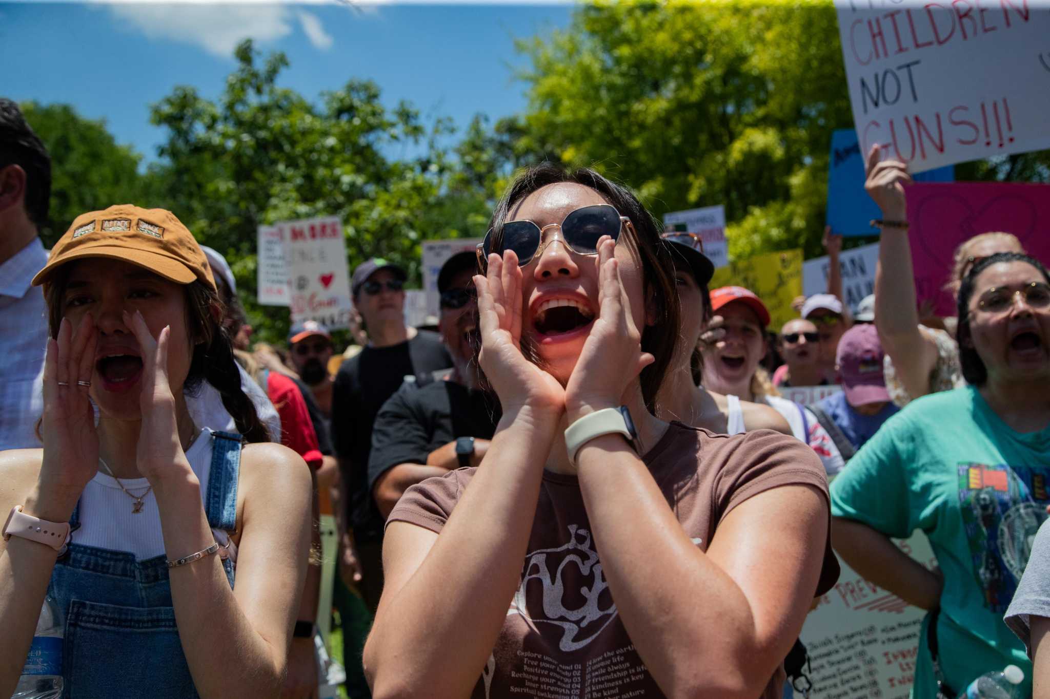 Houston NRA convention draws protesters at Discovery Green