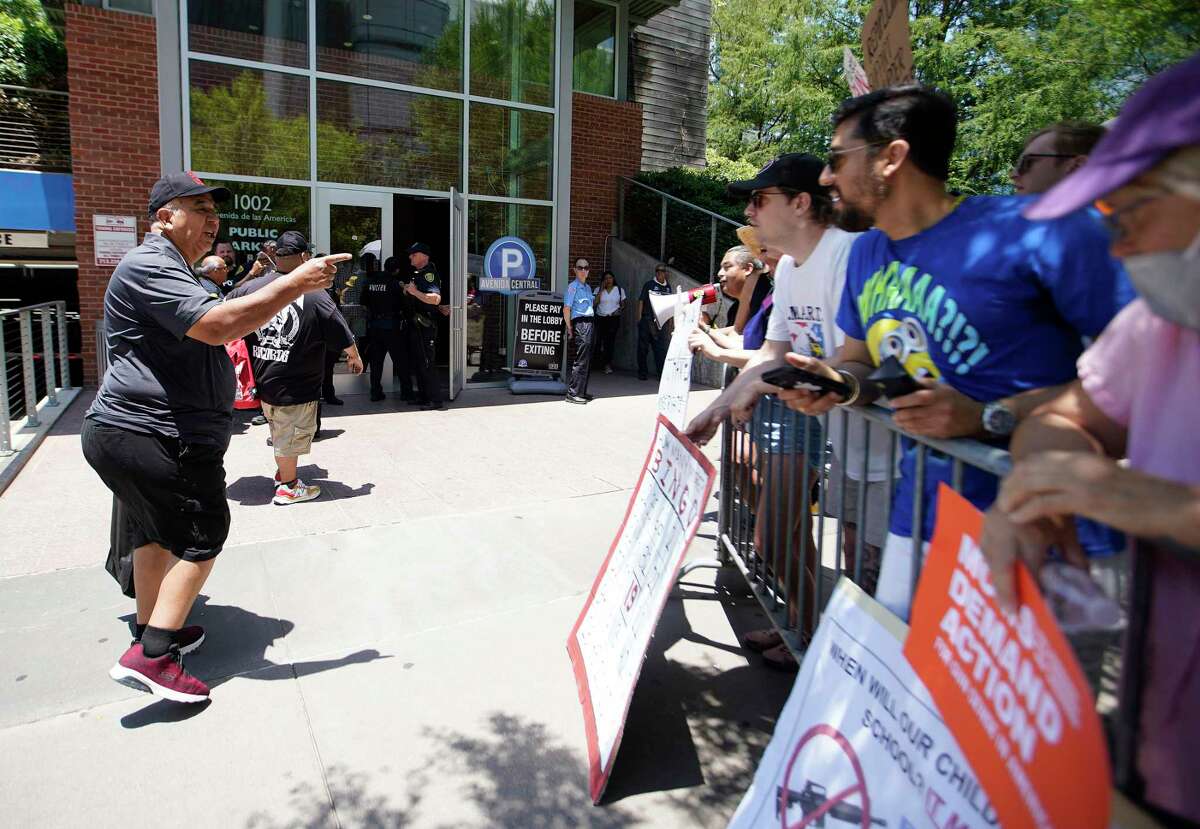 Houston NRA convention draws protesters at Discovery Green