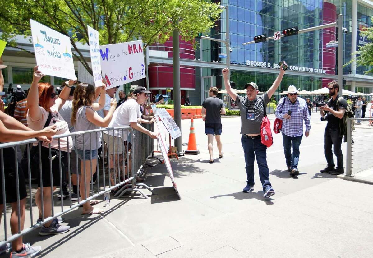 Houston NRA convention draws protesters at Discovery Green