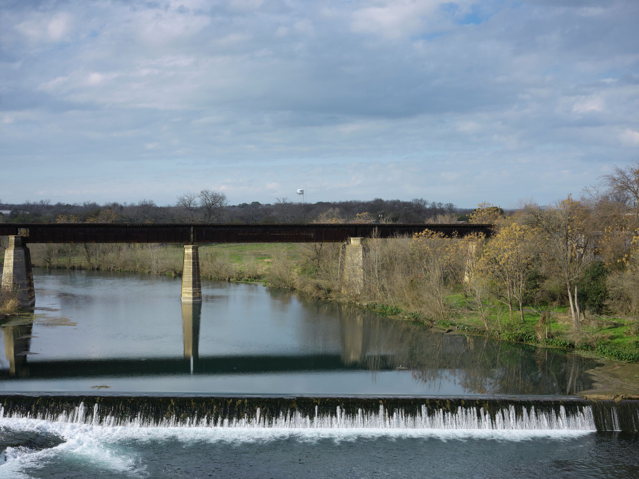 Man pulled from vehicle after driving off Guadalupe River bridge