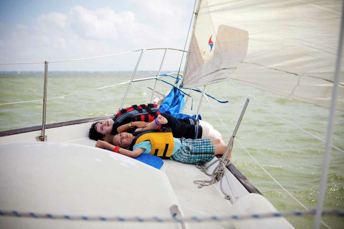 Galveston's brown beach water turned blue again. Here's why.