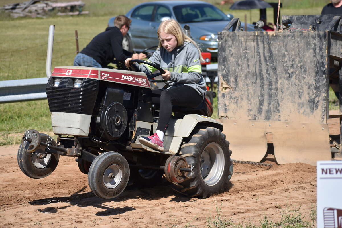 Garden tractors show power at show put on by Big Rapids Antique Farm ...