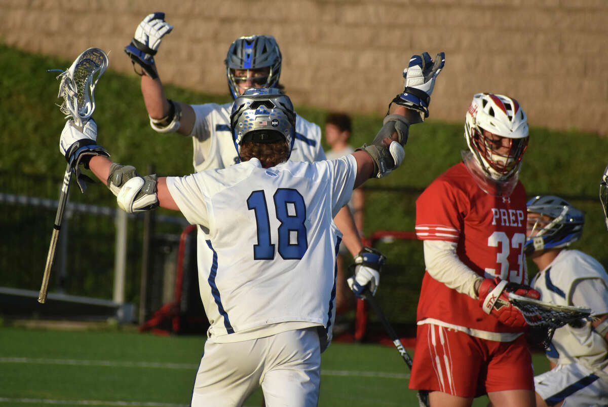 Christian Alliegro signs Wisconsin football from Avon Old Farms.