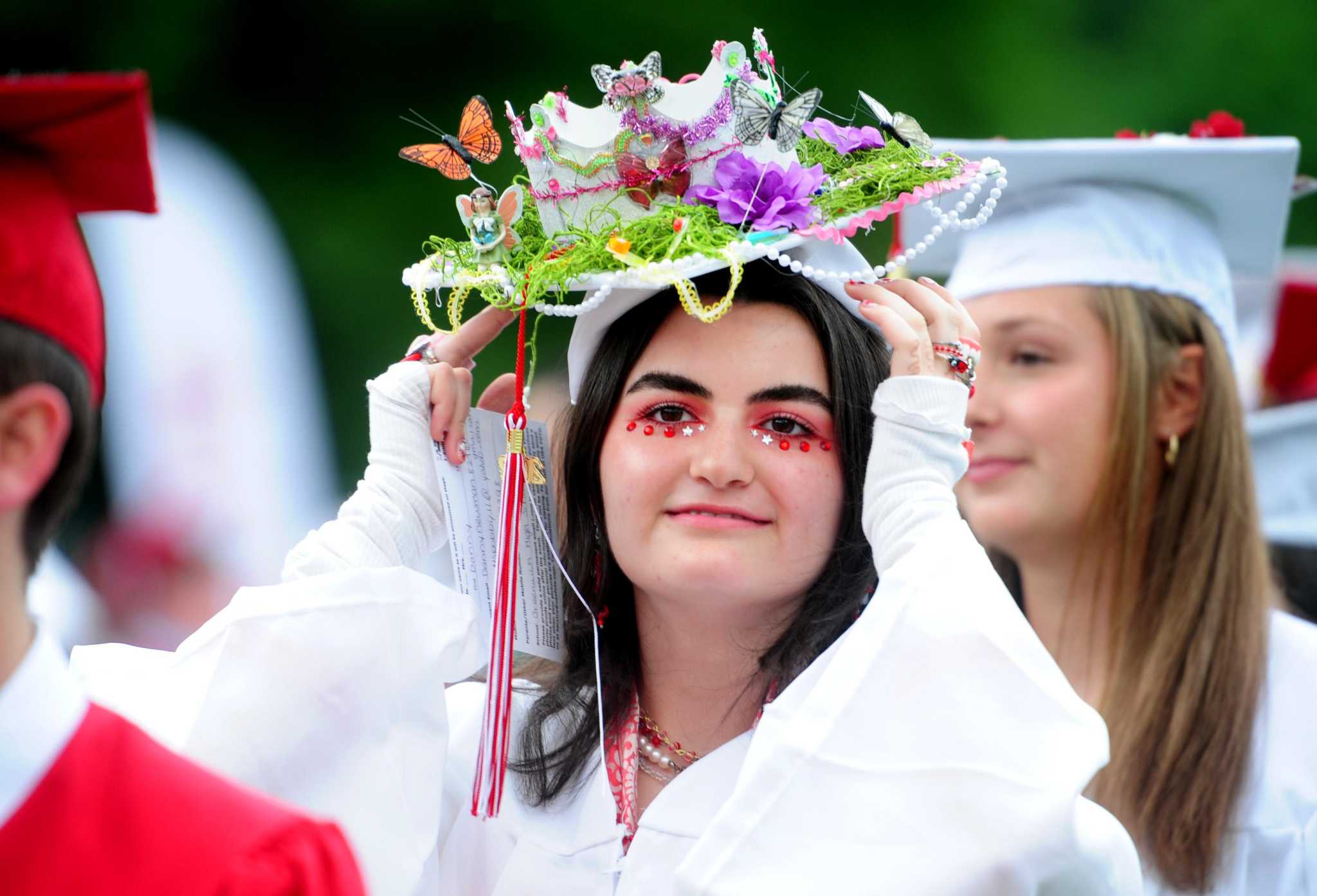 Greenwich High: 2022 graduation tips hats to ‘a group of young people ...