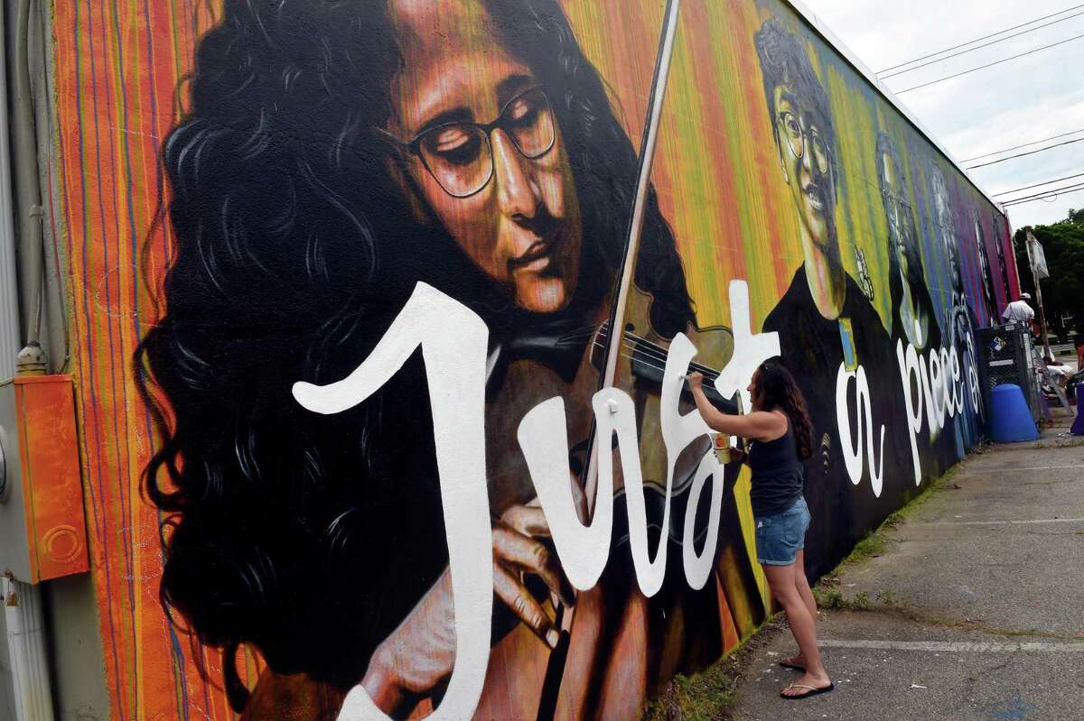 International artist paints ‘Just a Piece of Freedom’ mural in Old ...