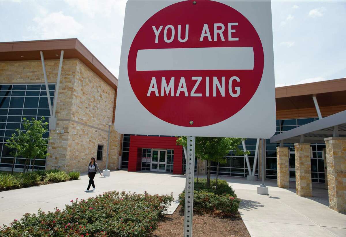 Artistic street signs in Houston suburb display positive messages