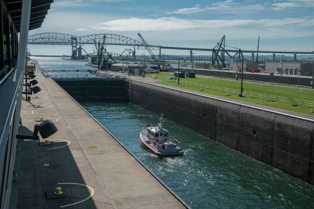 Travel to Sault Ste. Marie, experience the Soo Locks brimming in ...