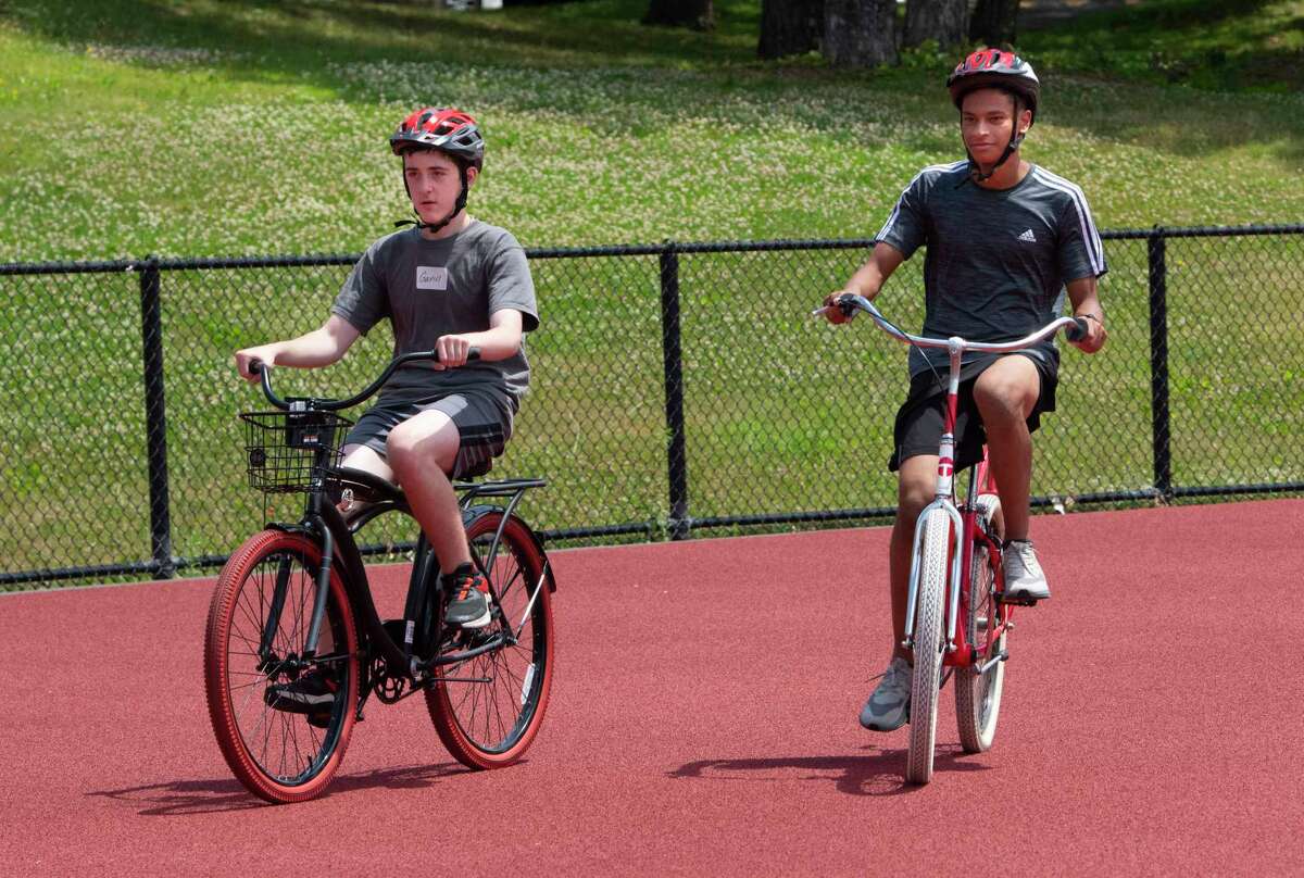 Children with disabilities who had to give up bikes years ago mastered ...