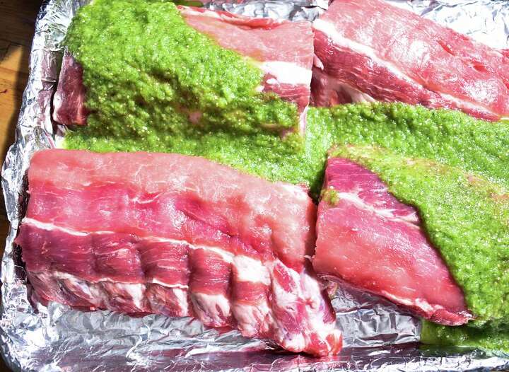 Slather pork ribs with fresh tomatillo salsa verde for a bite of summer