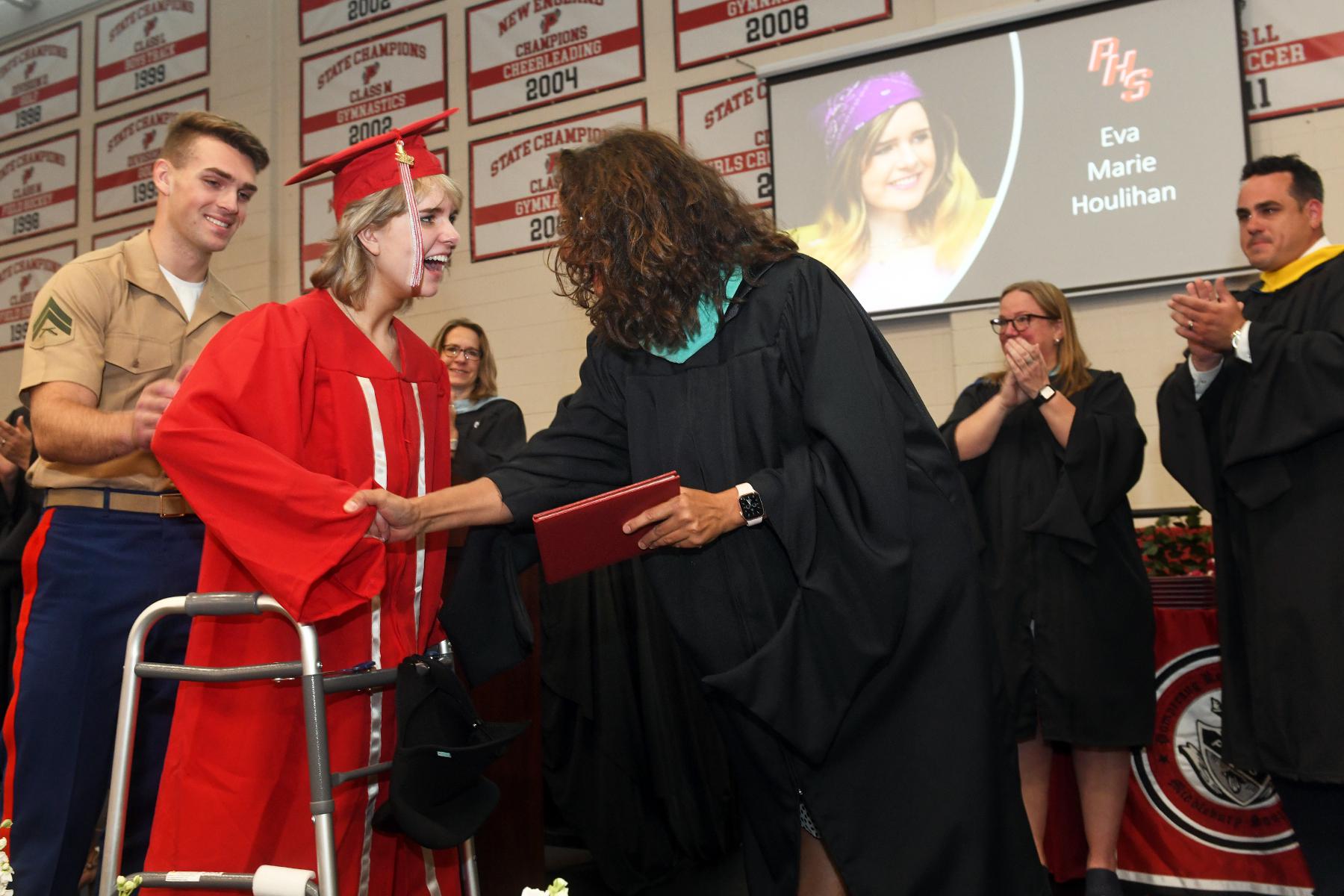 14 months after devastating crash, CT teen walks at graduation