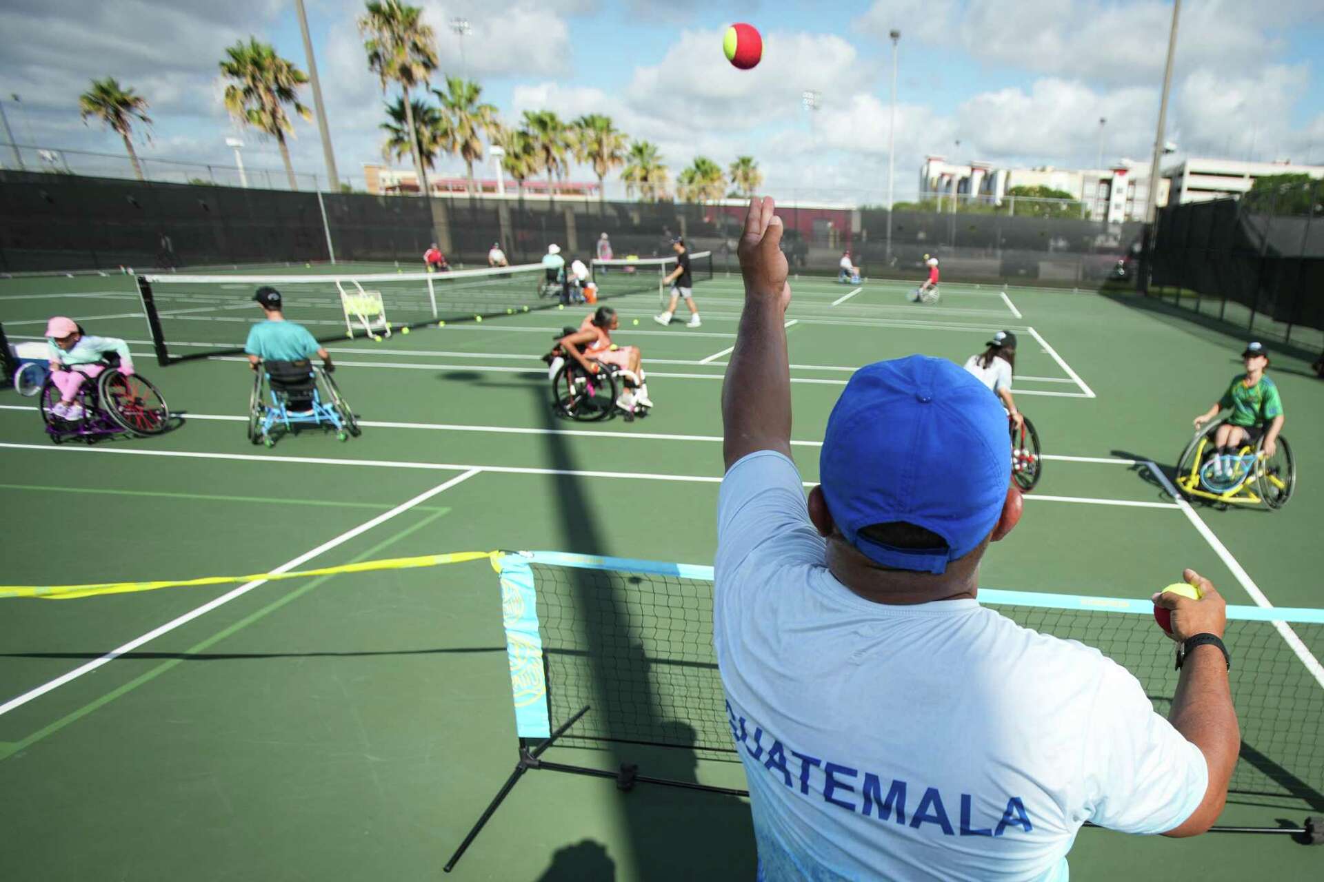 UH elite wheelchair tennis camp a hit for athletes