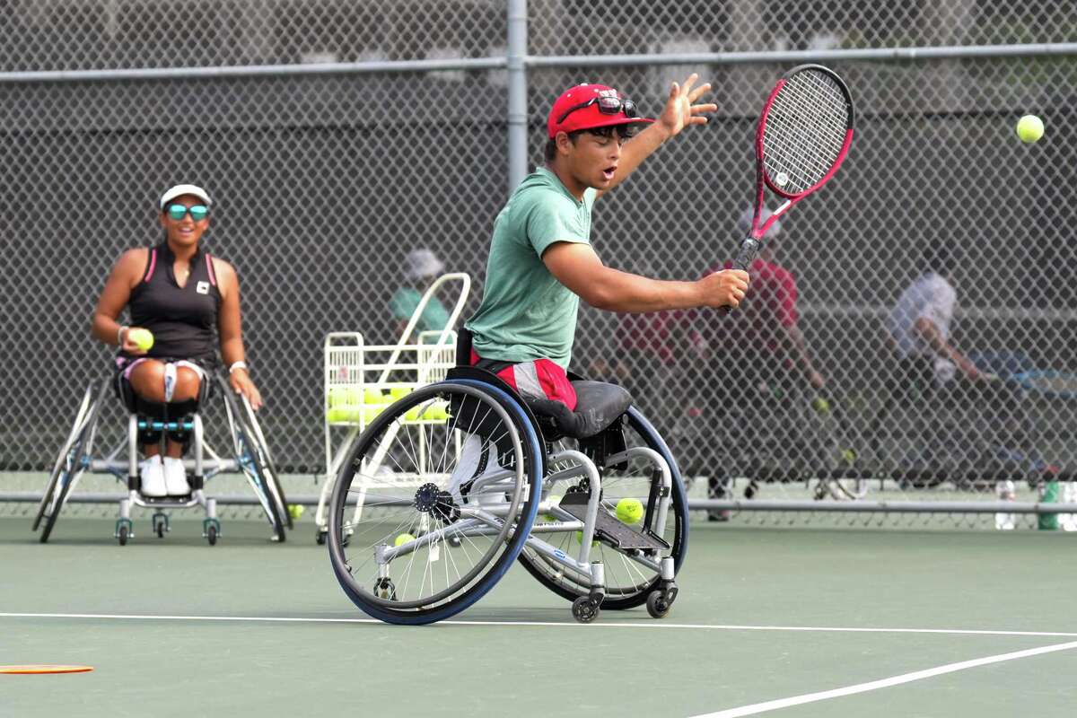 UH elite wheelchair tennis camp a hit for athletes