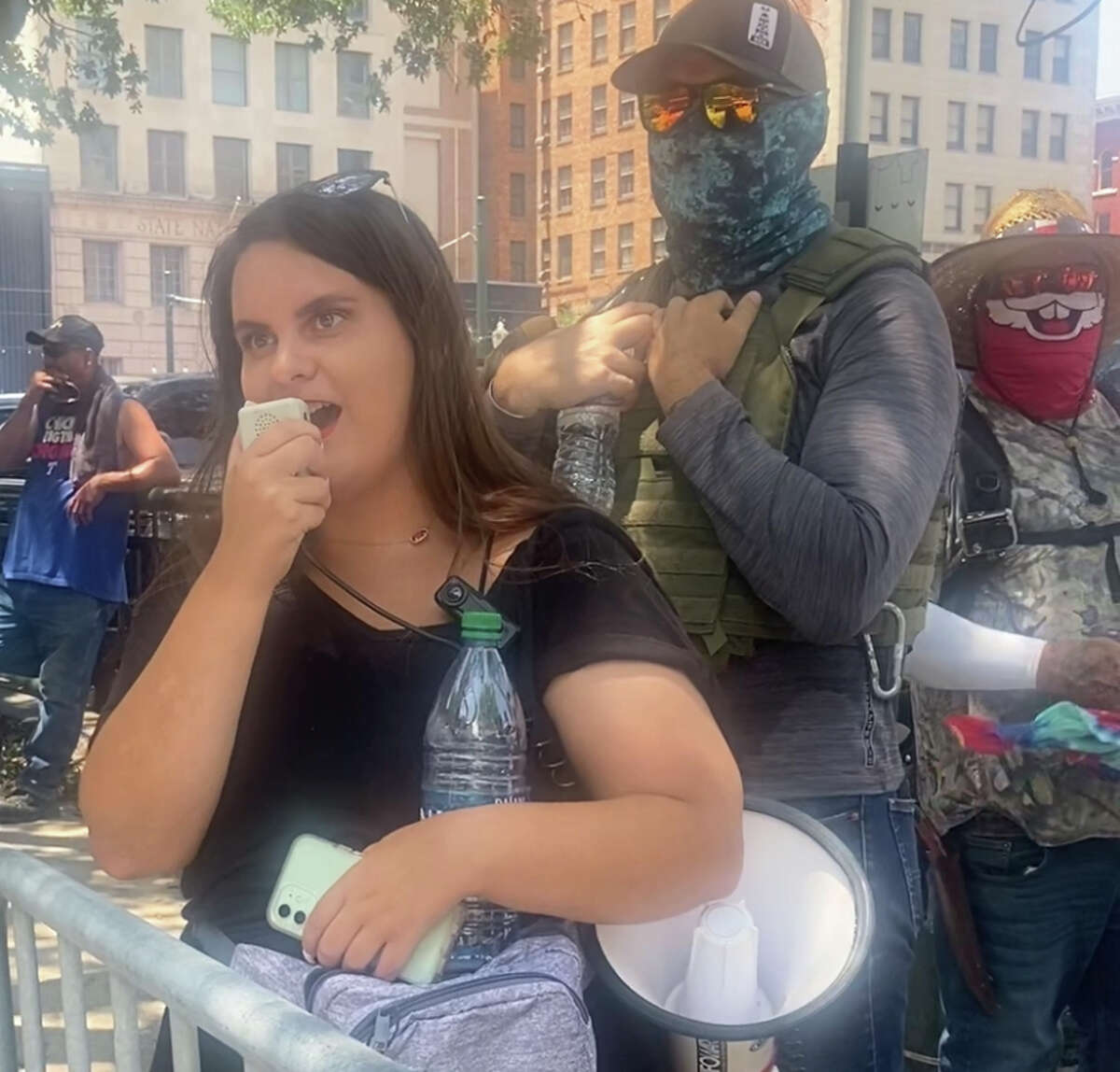Armed men in Buc-ee's masks watched over anti-trans activist Kelly ...