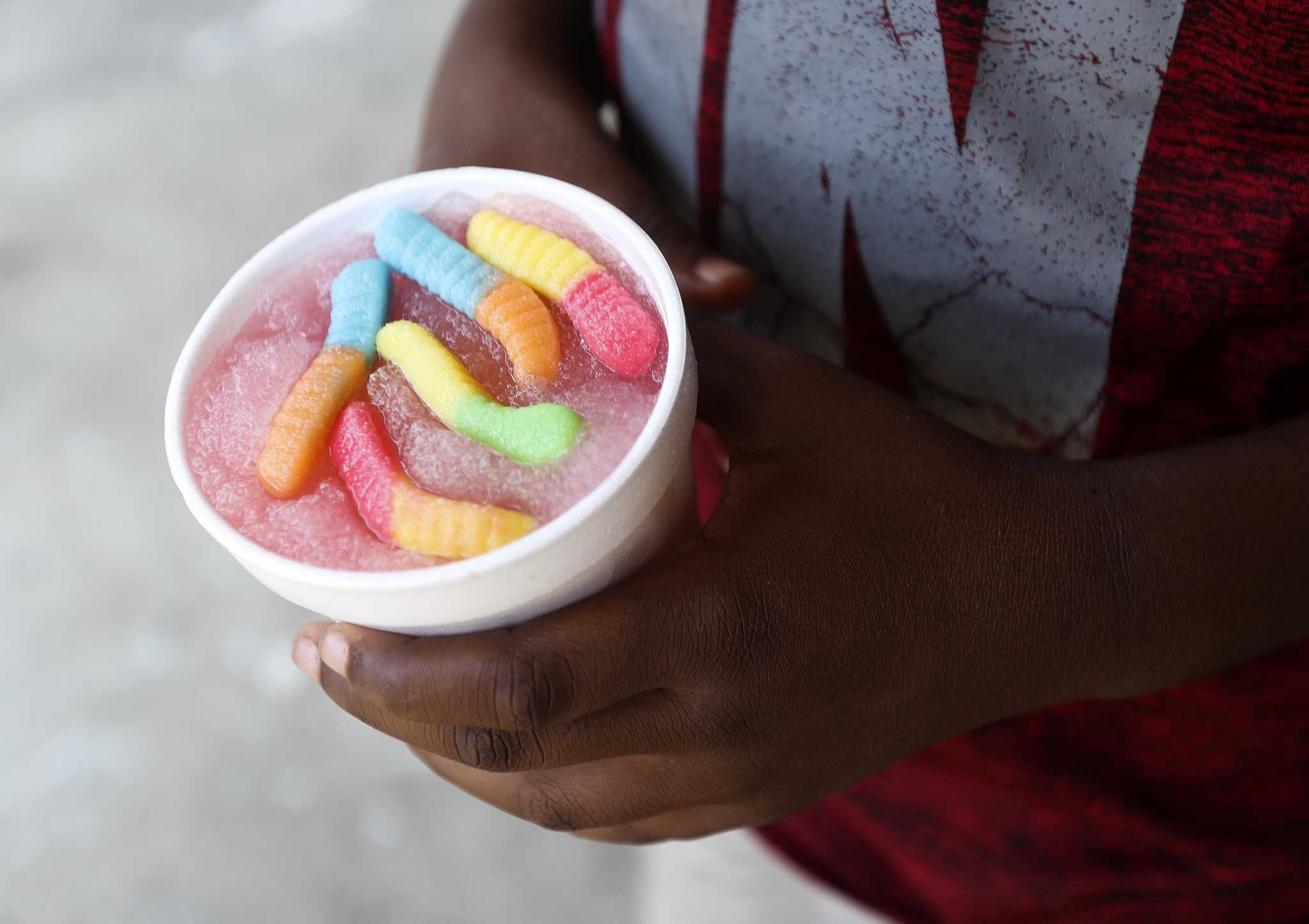 A Conroe man provides cheap snow cones on hot Texas summer days