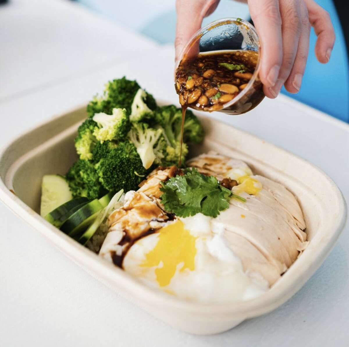 Poached chicken focus of Rooster & Rice in Houston's Garden Oaks