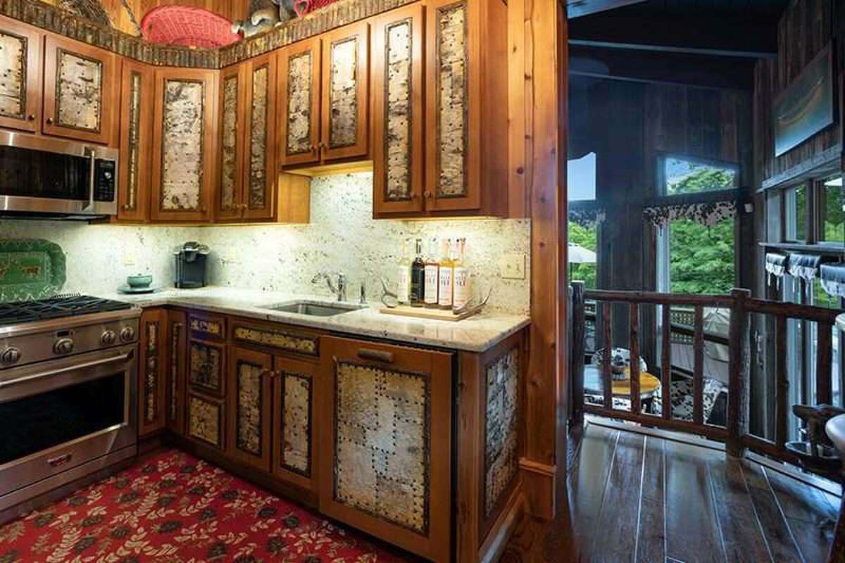 Michele Riggi, husband list Lake Placid compound for $31 million