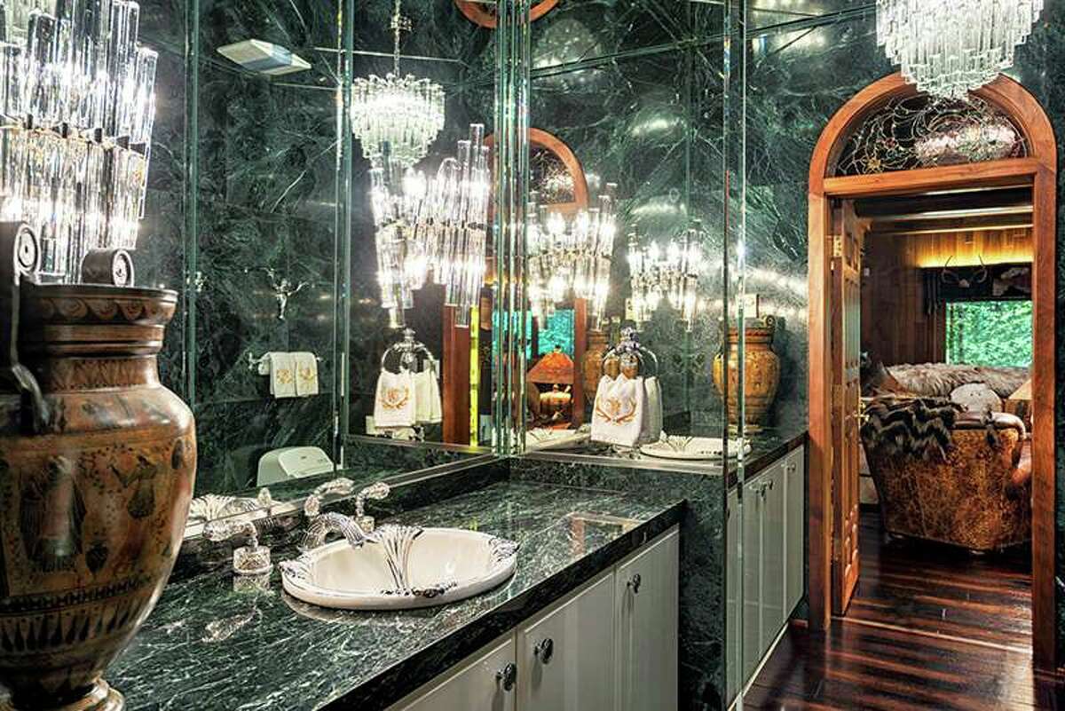 Michele Riggi, husband list Lake Placid compound for $31 million