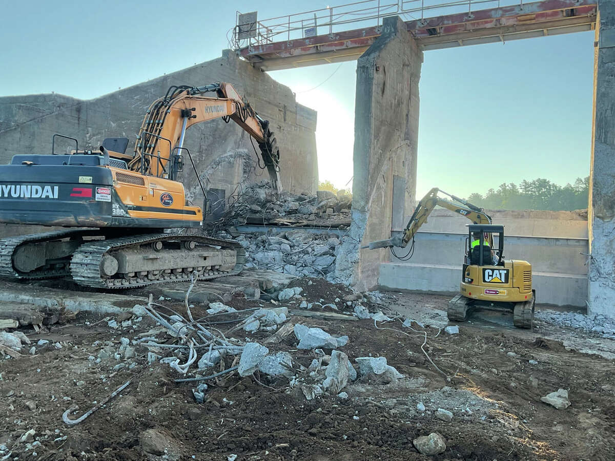 Workers continue to stabilize the Sanford Lake Dam