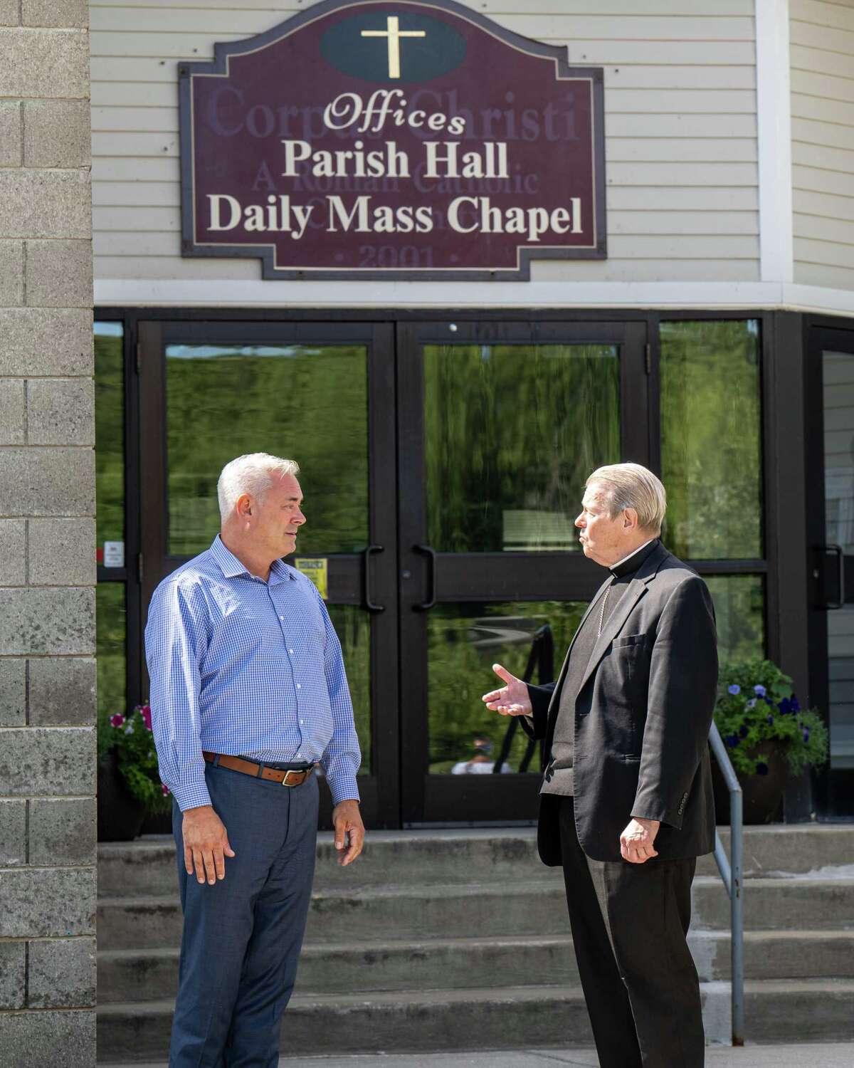 On Sunday, Bishop Edward B. Scharfenberger met on the steps of Corpus ...