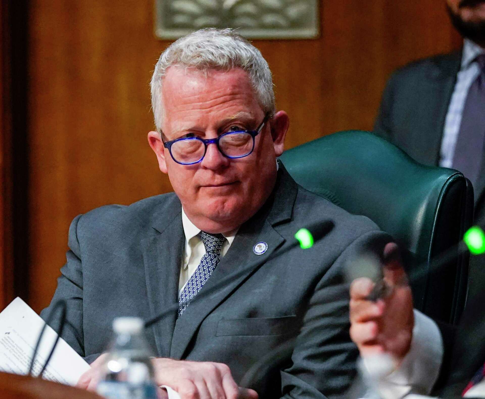 Why do local Houston officials have to resign before running?