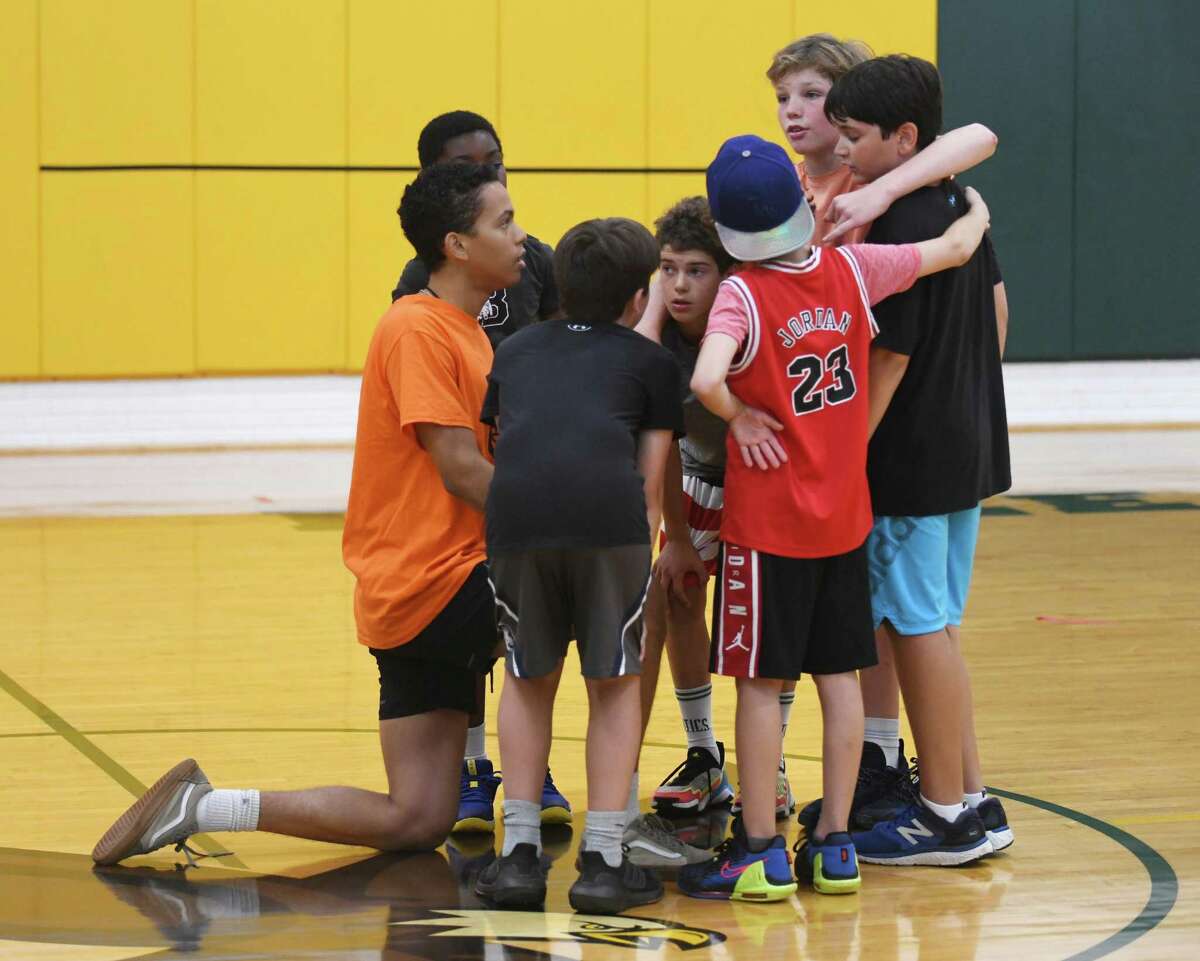 Greenwich kids hit the court at summer basketball camp held at Eagle Hill