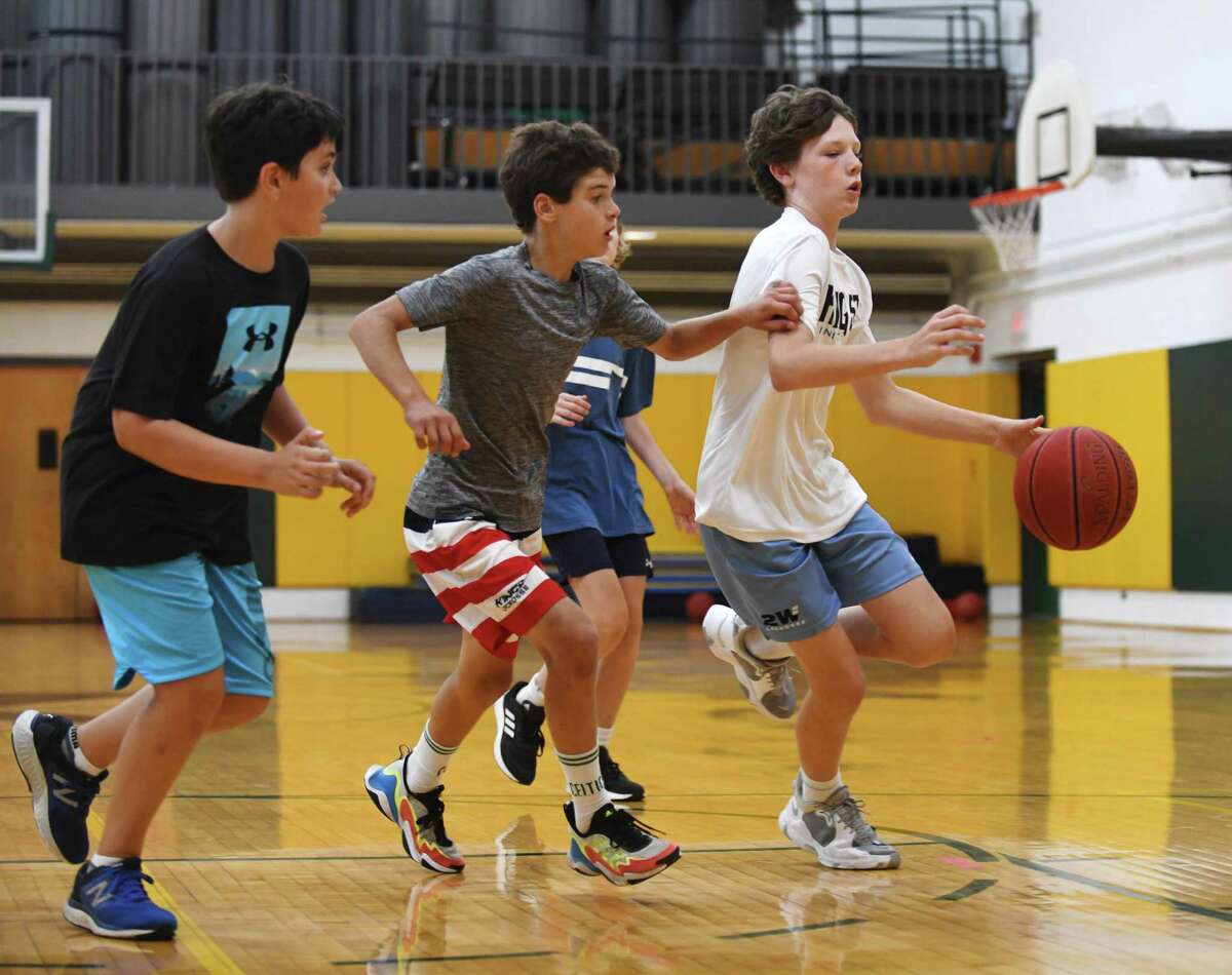 Greenwich kids hit the court at summer basketball camp held at Eagle Hill