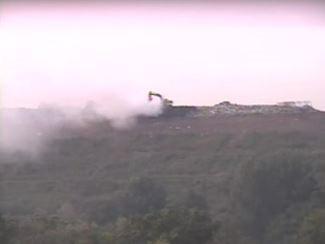 Manchester fire at landfill has been extinguished, officials say