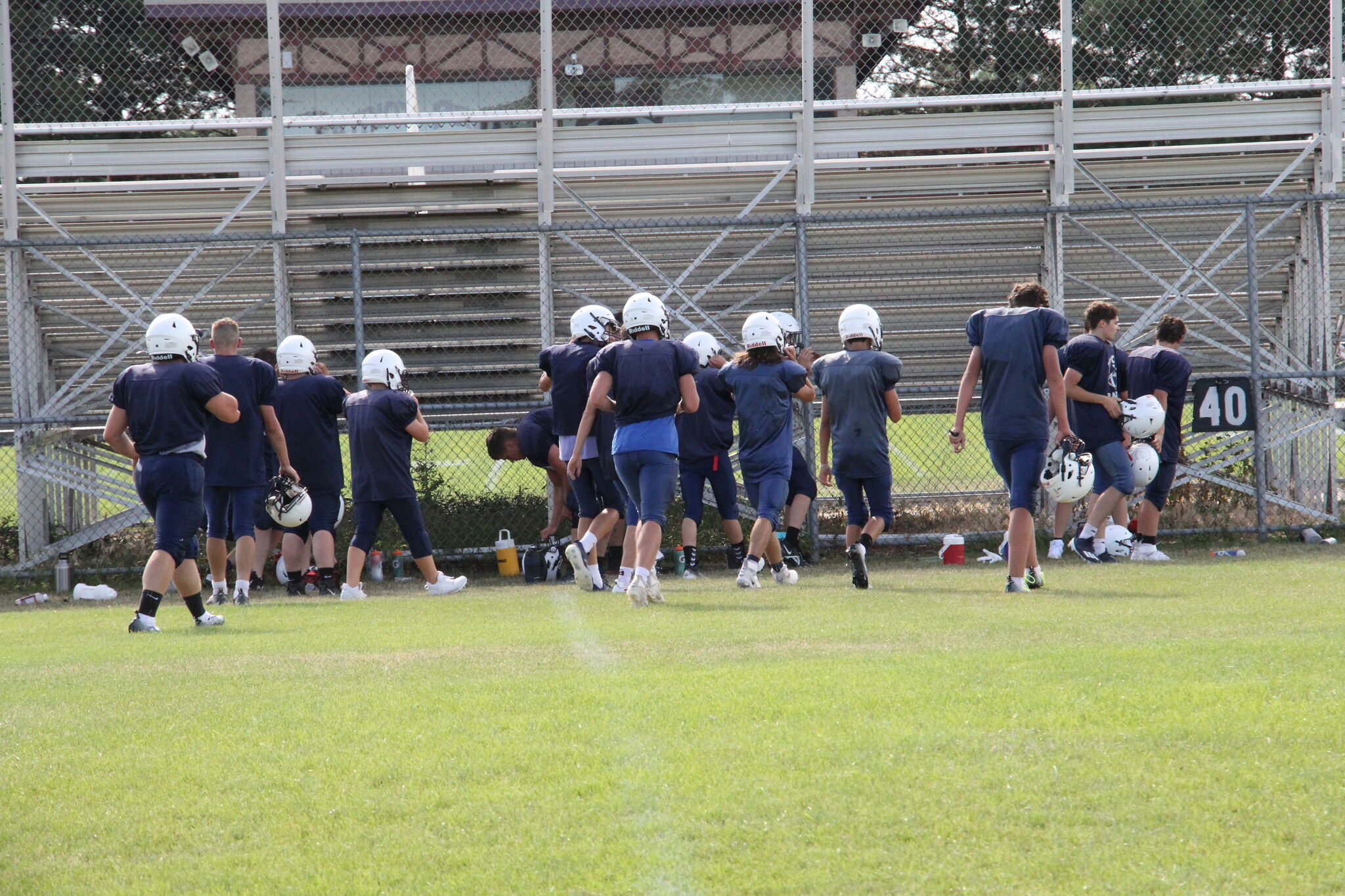 USA football practices full speed hits and stretches Friday
