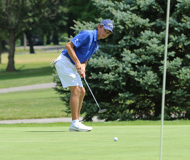 Edwardsville retains, Marquette regains MadCo boys golf crowns at Belk Park