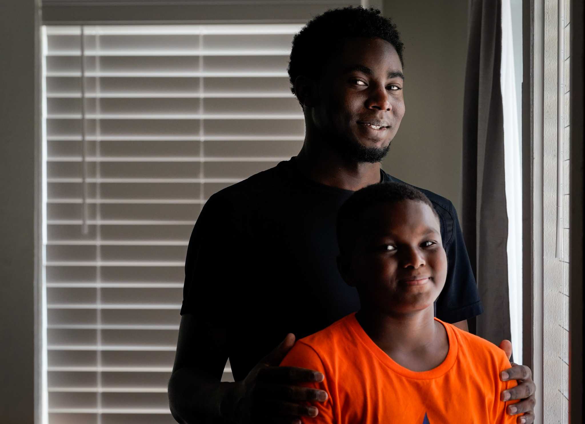 After many tragedies, Katy man raising young brother gets new home
