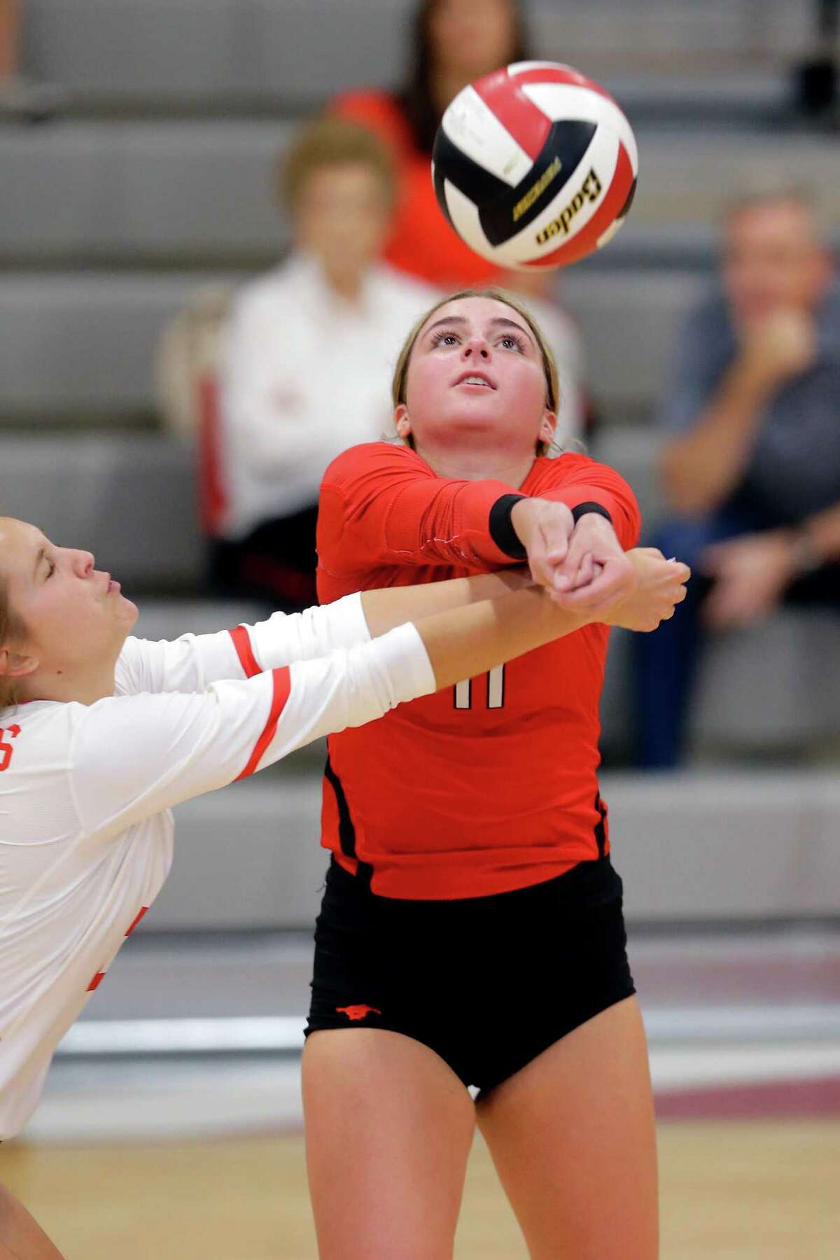 High school volleyball: Foster downs Memorial in four sets
